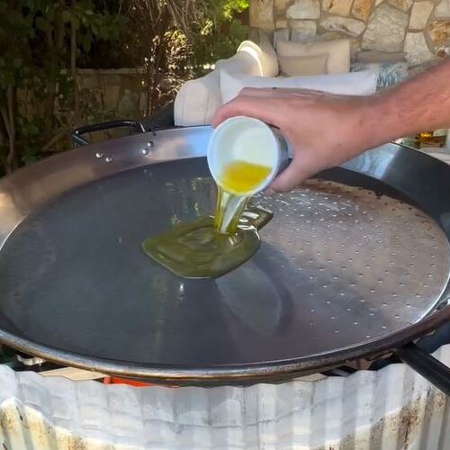 Receta de @fanaticook: Paella de pato confitado, higos caramelizados y piparras